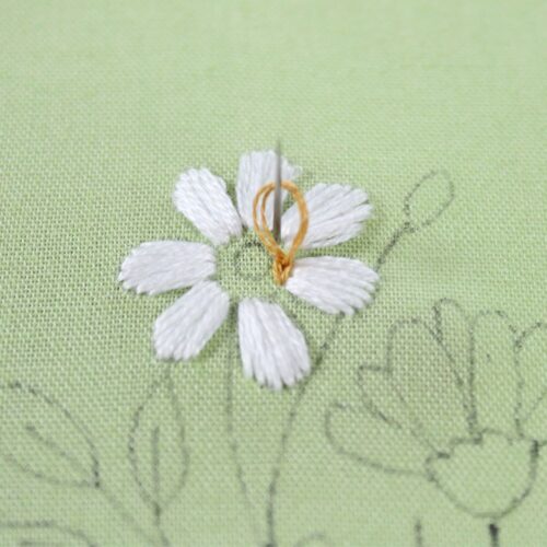 Learn How to Embroider a Daisy With This Free Embroidery Pattern